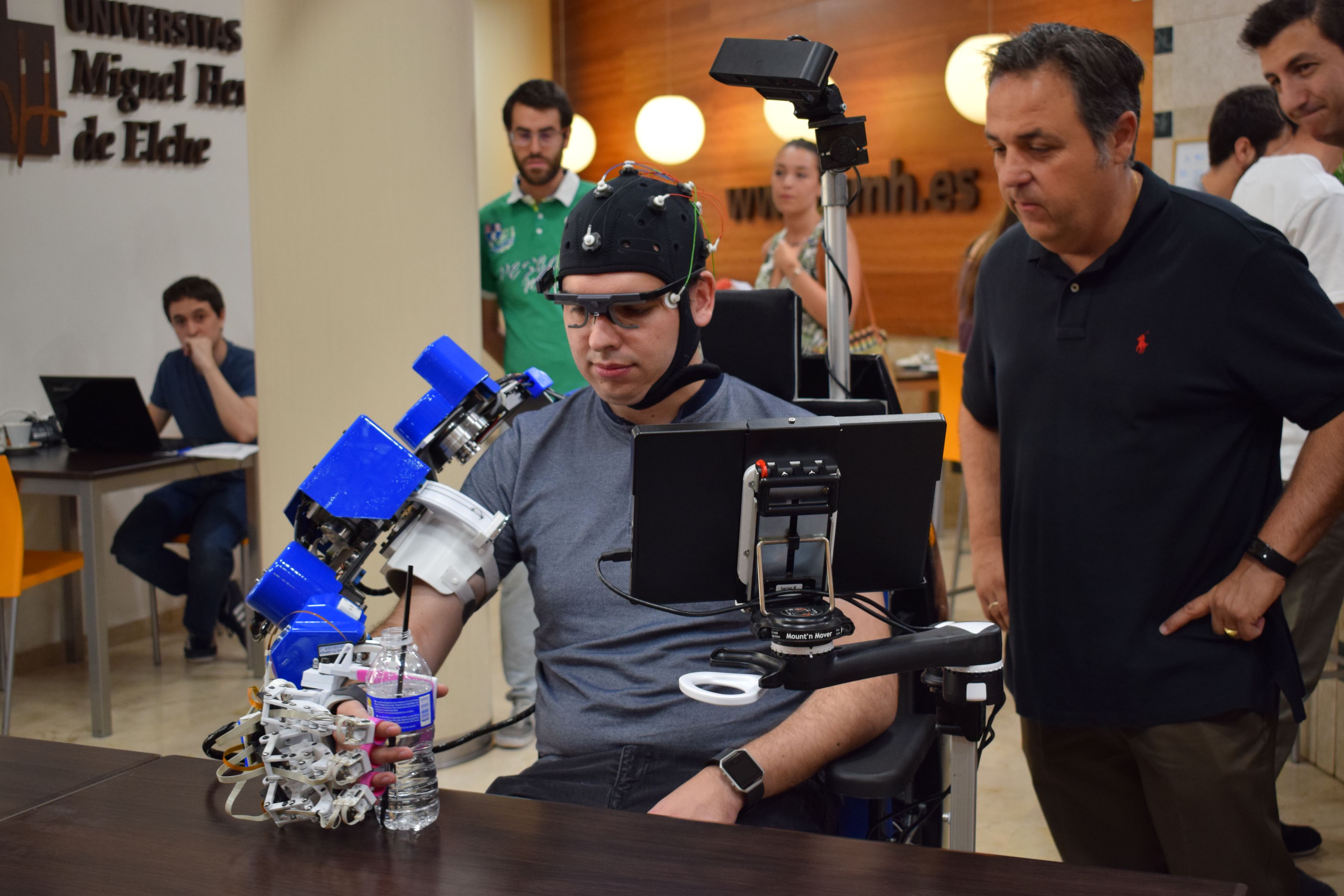 Robotic exoskeleton enables disabled people to eat or drink by ...